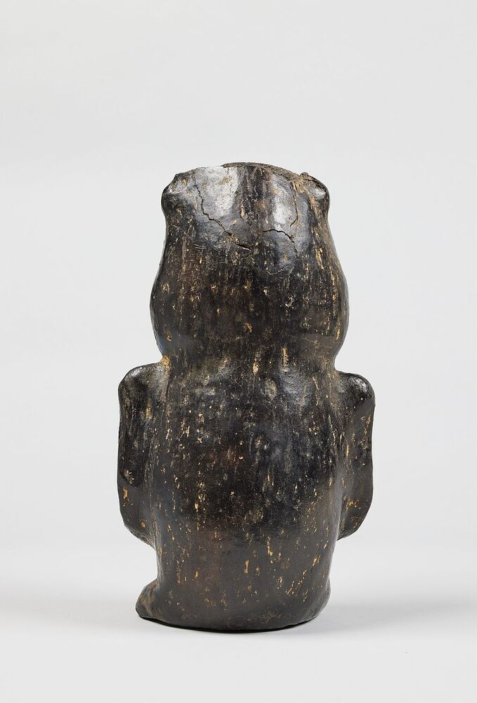 40091a - Grotesque figure with slit eyes and mouth - Sainsbury Centre