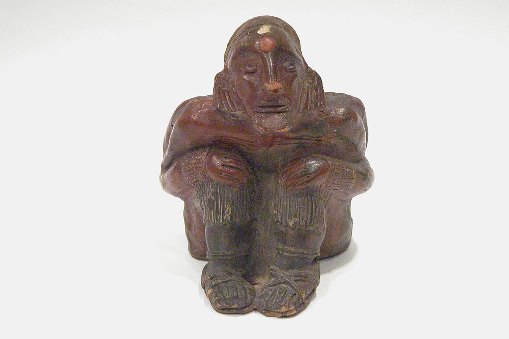 40092 (Wellcome) - Crouching grotesque figure with beard and sandals ...